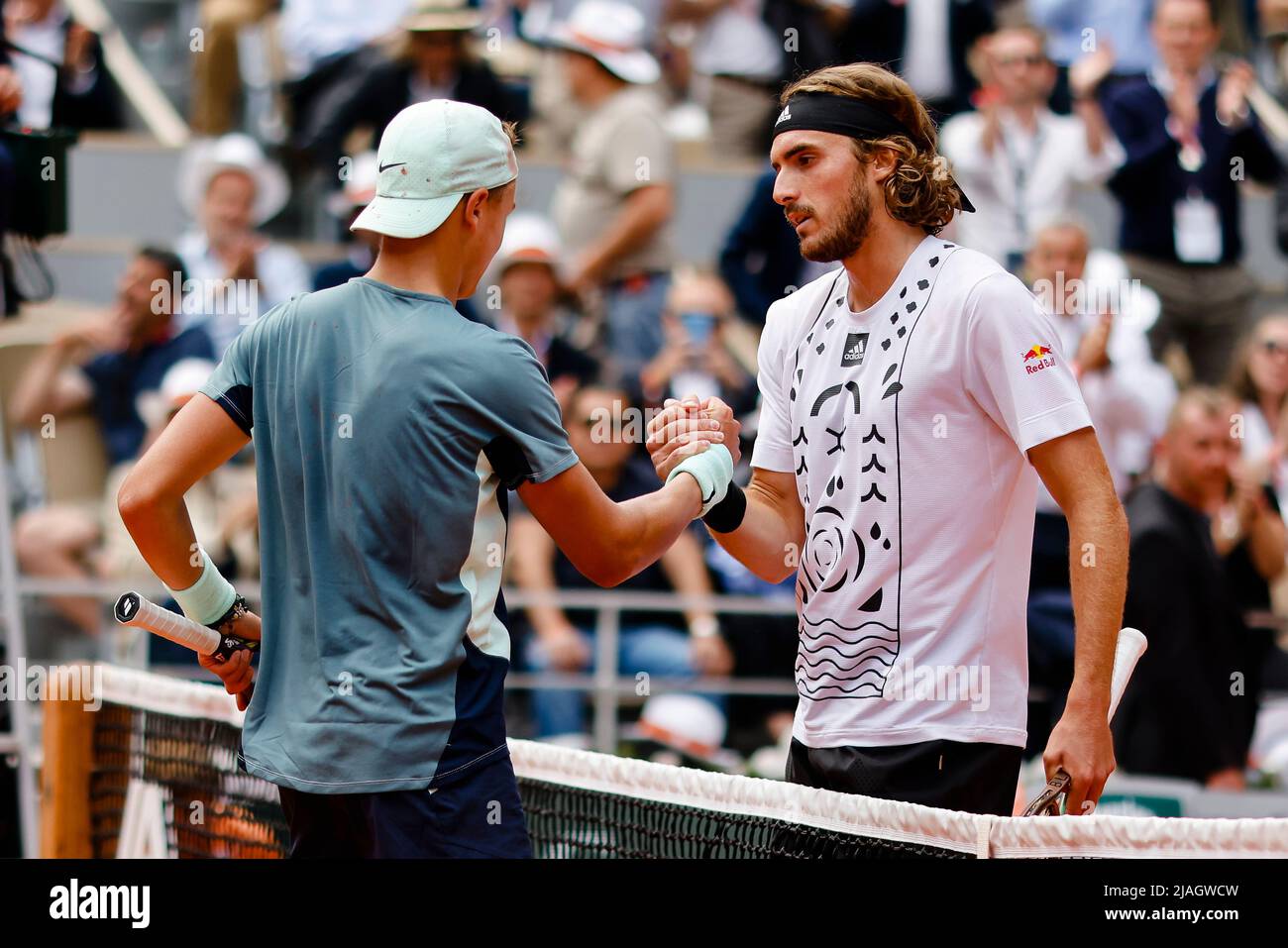 Paris, France. 30th May, 2022. Tennis player Stefanos Tsitsipas (R) from Greece and Holger Rune ...