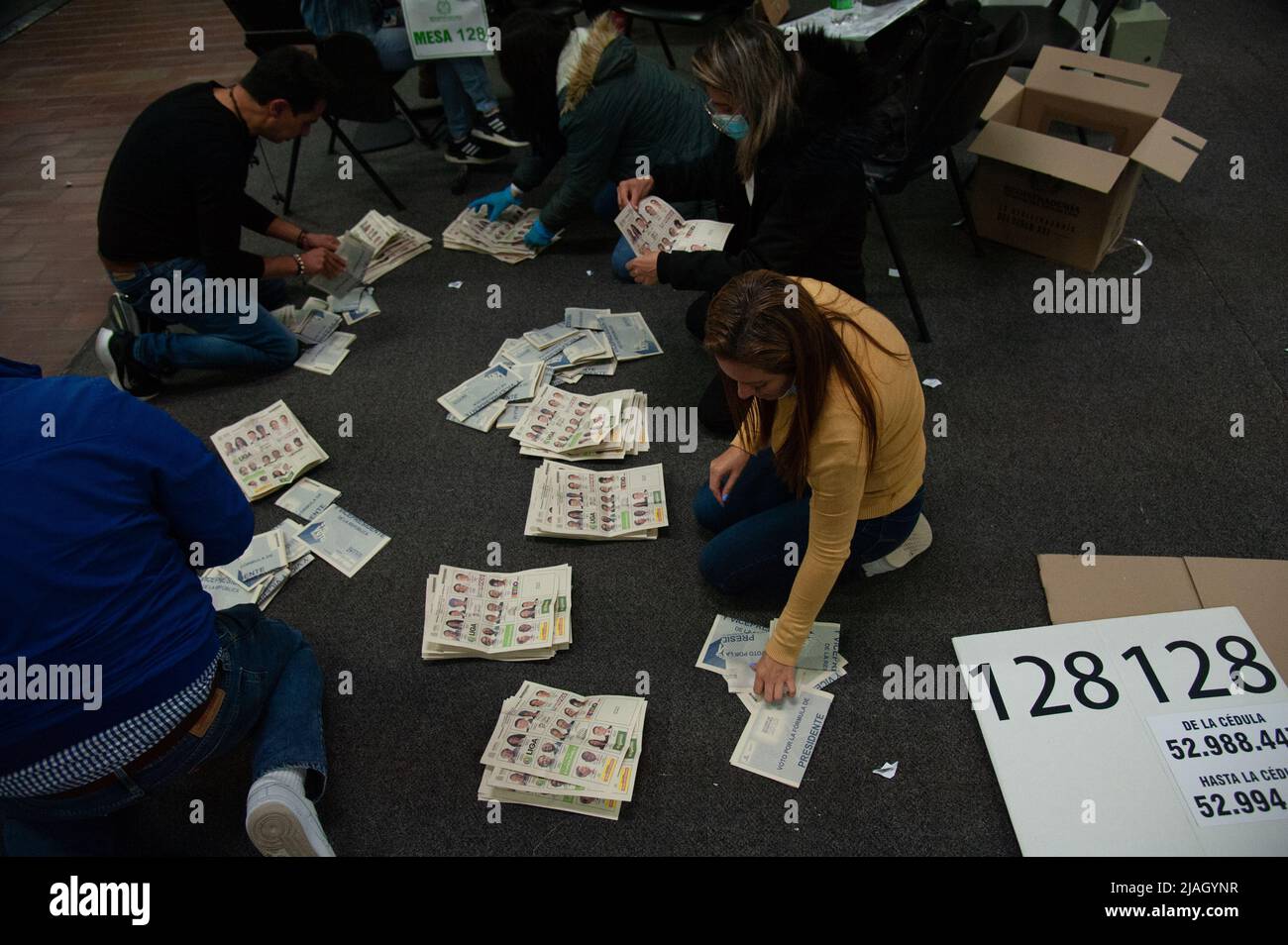 Electoral jury members count votes after elections rally ended during ...