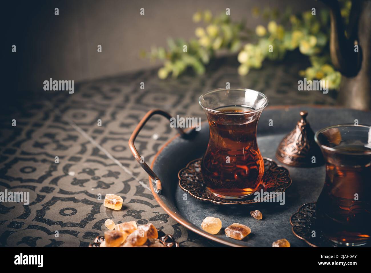 Turkish tea in traditional glass closeup on tile background Stock Photo ...