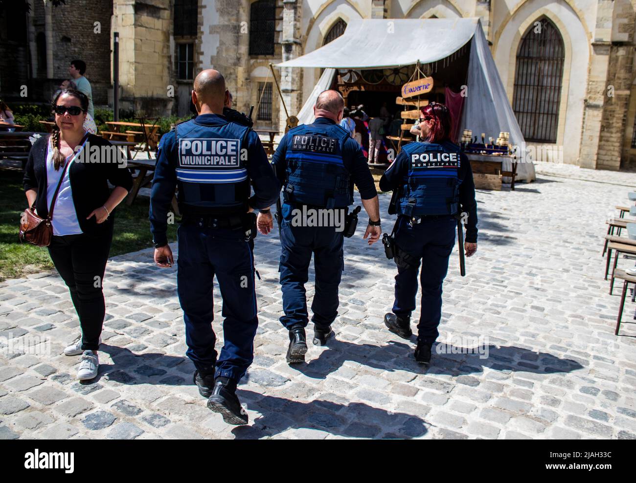 Reims, France - May 28, 2022 Police officers protecting the medieval ...
