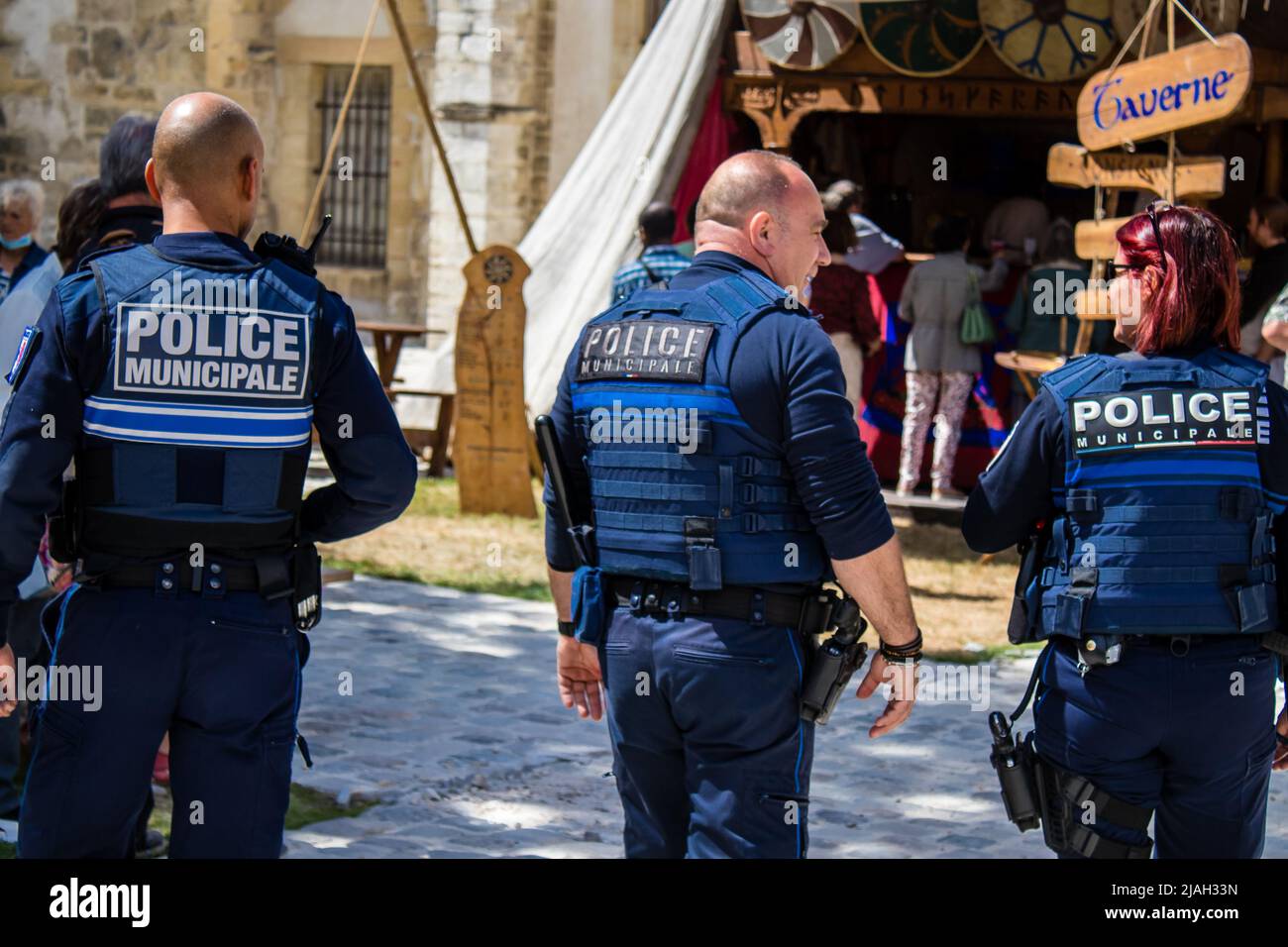 Reims, France - May 28, 2022 Police officers protecting the medieval ...