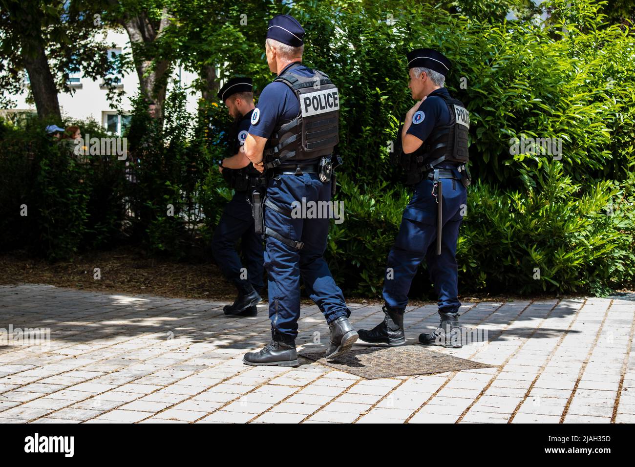 Reims, France - May 28, 2022 Police officers protecting the medieval ...
