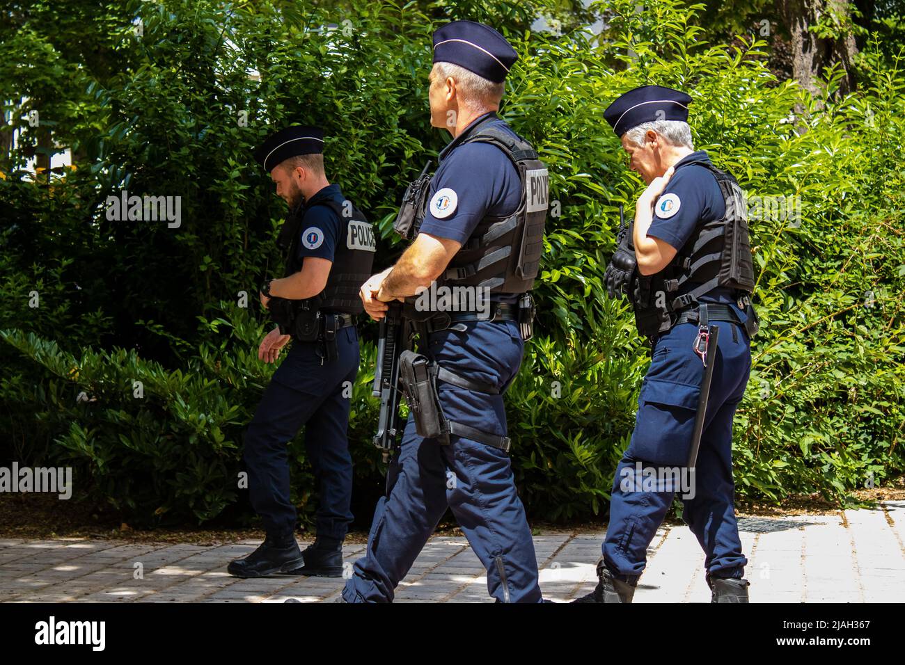Reims, France - May 28, 2022 Police officers protecting the medieval ...