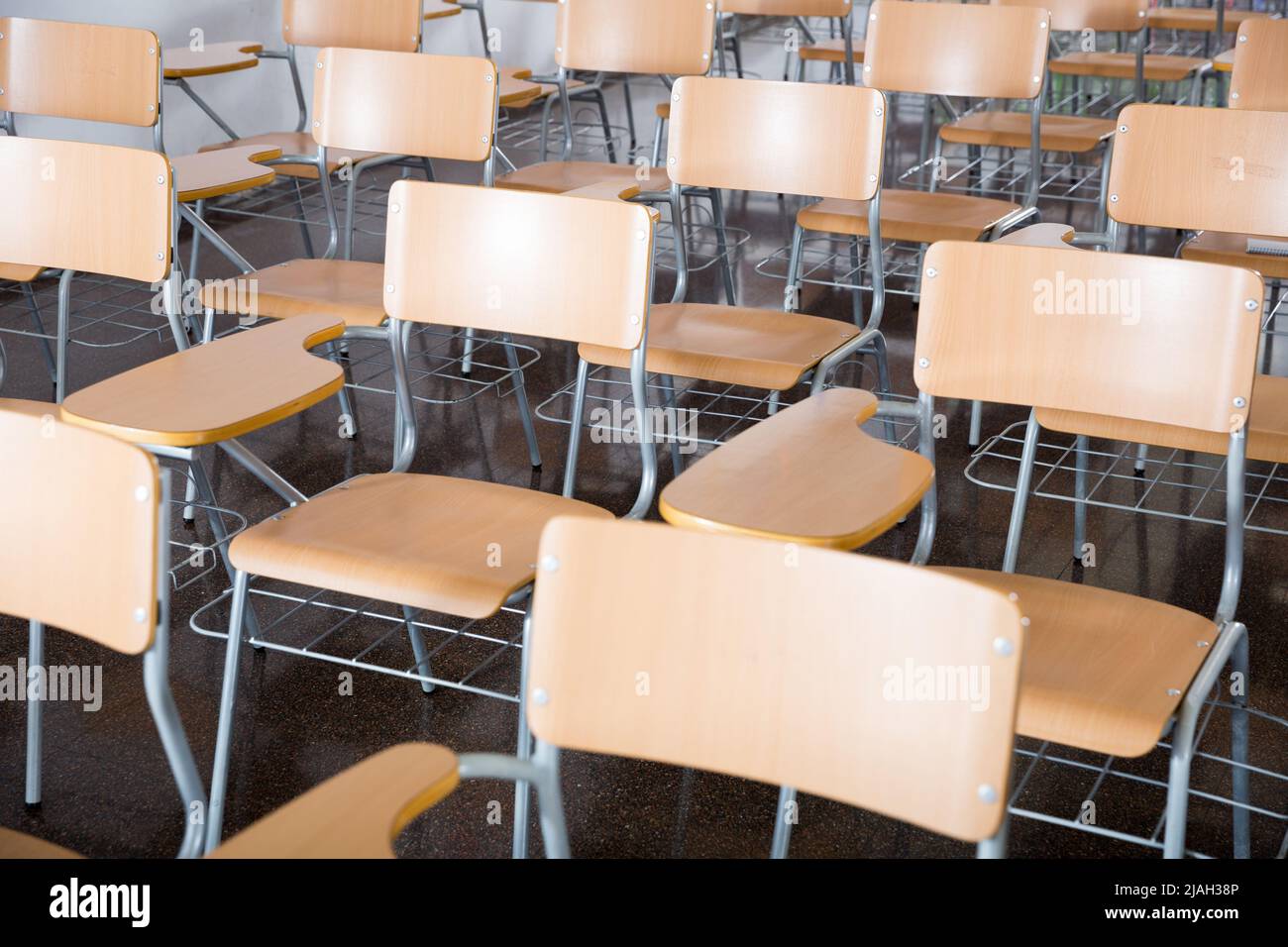 Wooden chairs in rows in classroom of school interior indoor Stock ...