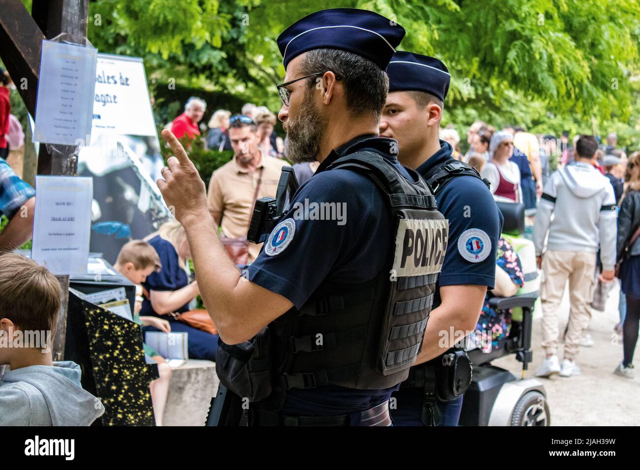 Reims, France - May 28, 2022 Police officers protecting the medieval ...
