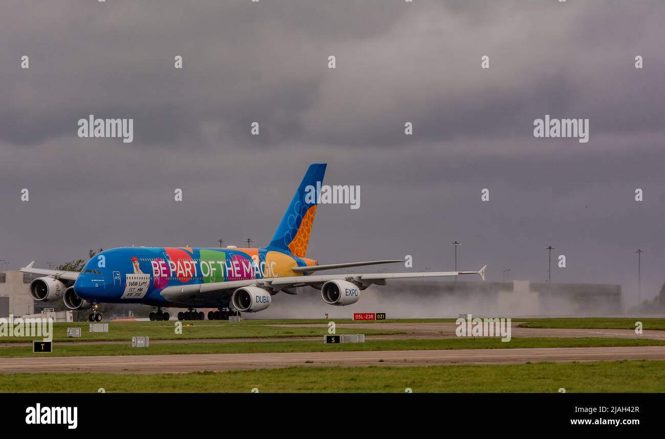 The mighty A380 Emirates expo colourful plane Stock Photo - Alamy