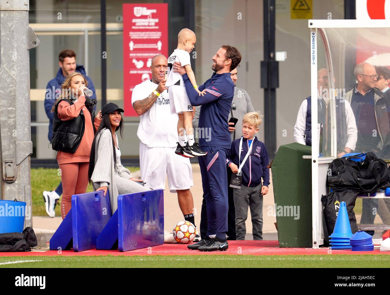 England manager Gareth Southgate meets River Rhodes during a training ...