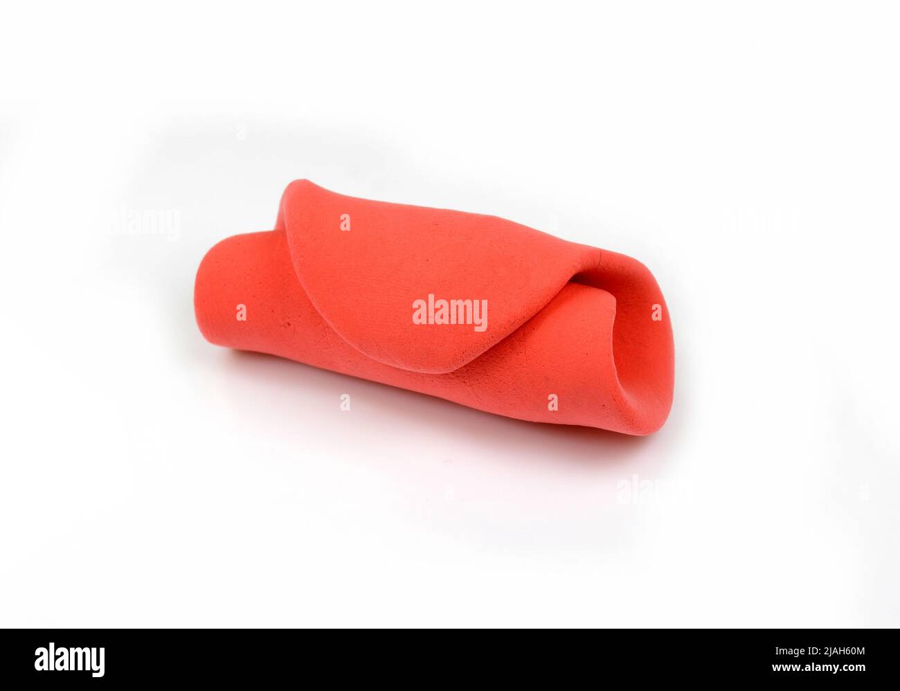 Red Plasticine ball isolated on the white background Stock Photo - Alamy