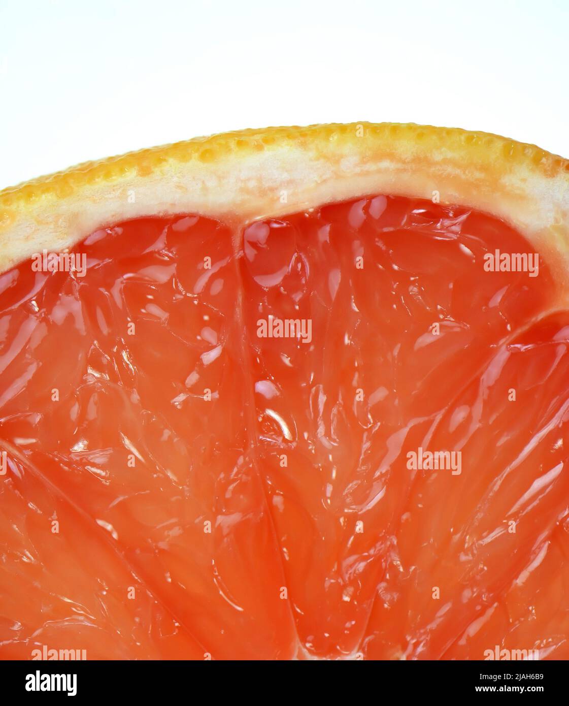 Top view of grapefruit slice, as background. Macro of red grapefruit. fruit citrus grapefruit ...