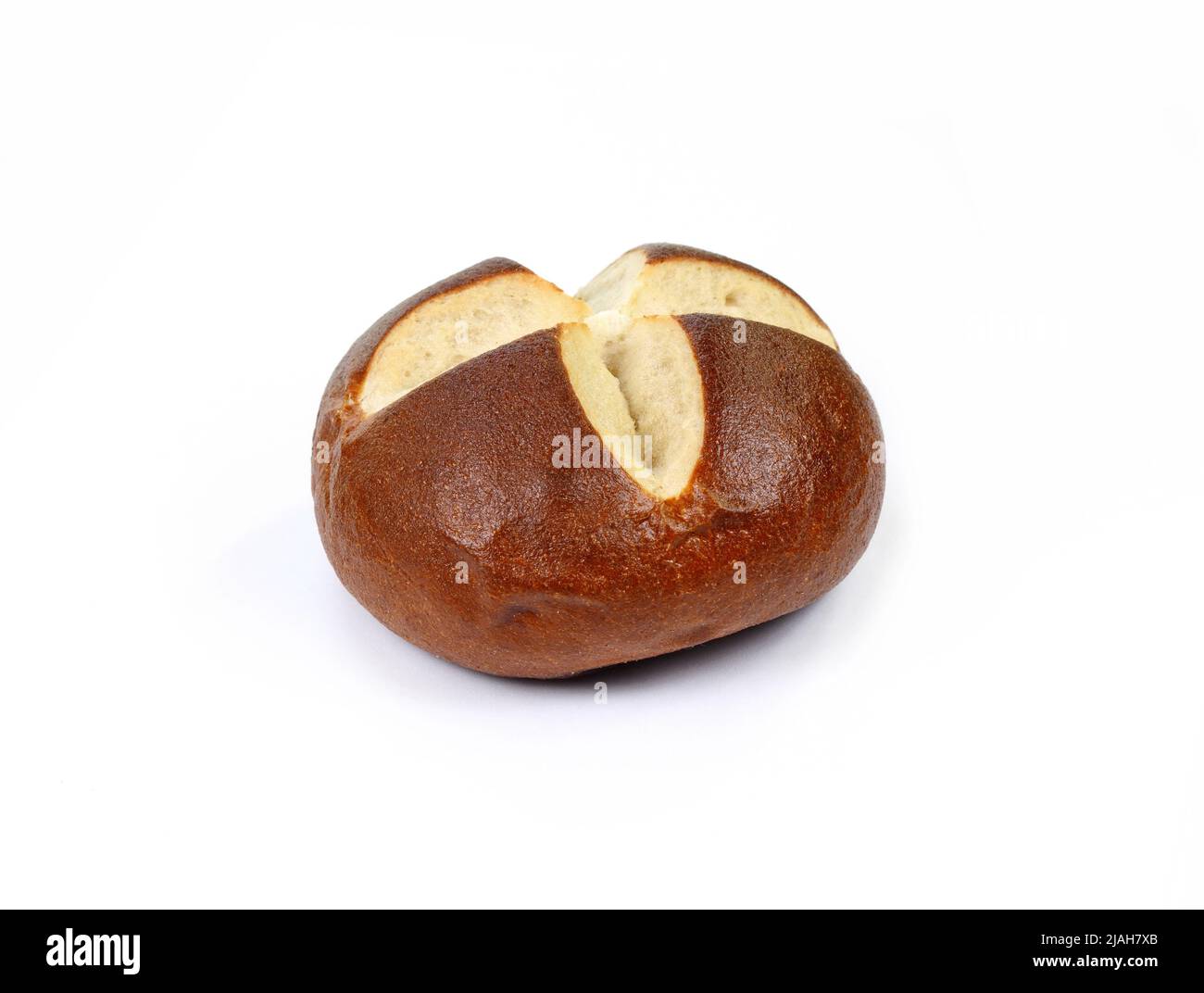 Round Easter bun isolated on white background with clipping path. Brown ...