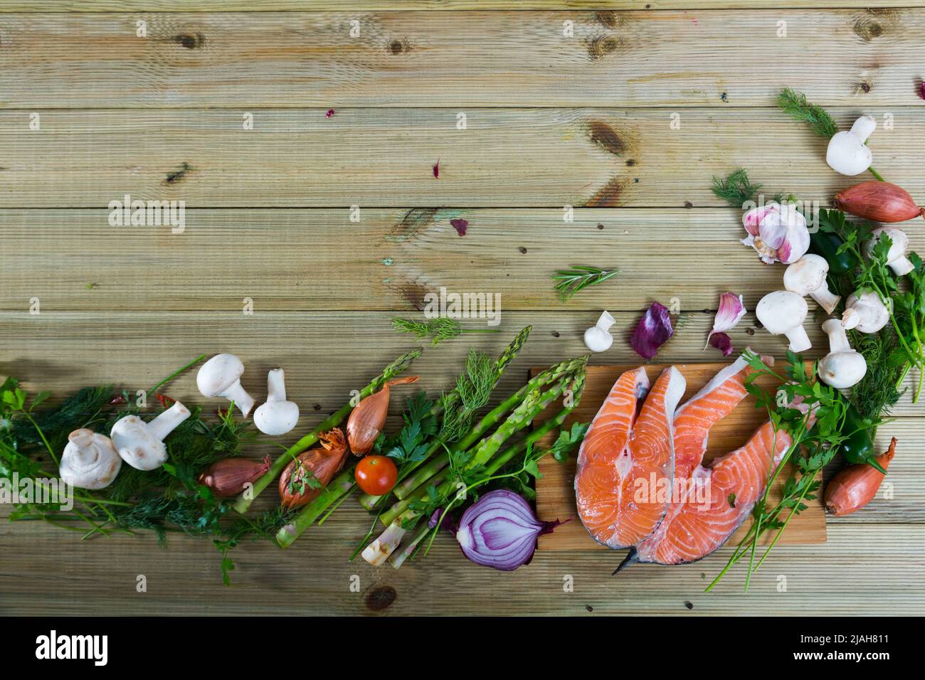 Food frame with fish and vegetables Stock Photo - Alamy