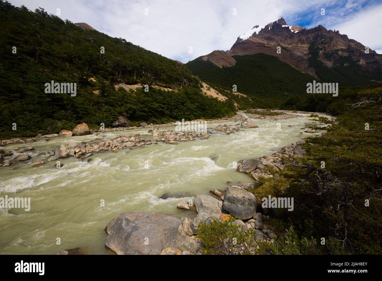 Stream from melting glaciers in Andes mountains Stock Photo - Alamy