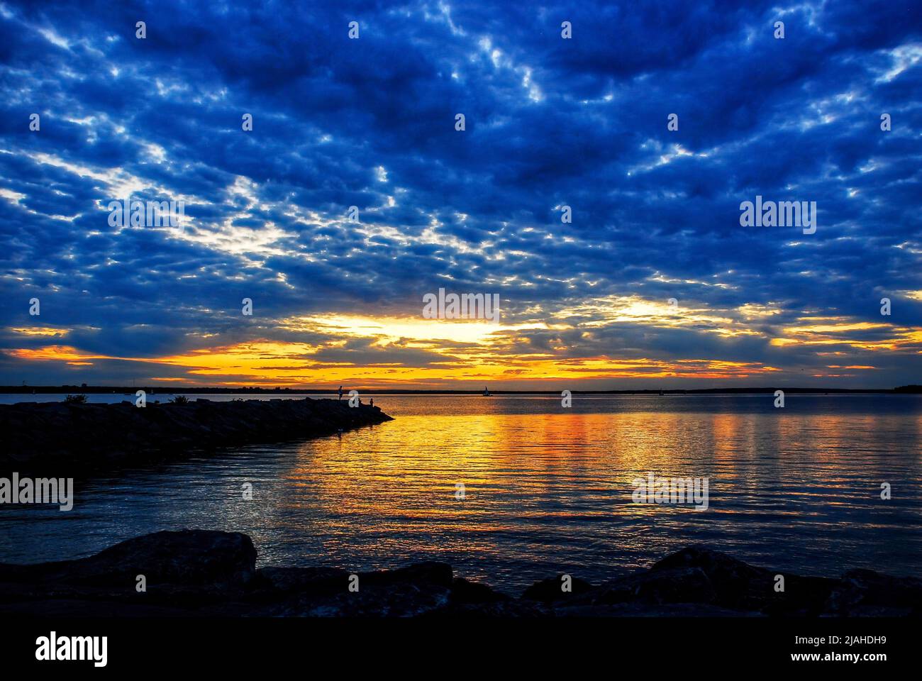 Sunset over Ottawa River with dramatic cloudy sky Stock Photo - Alamy
