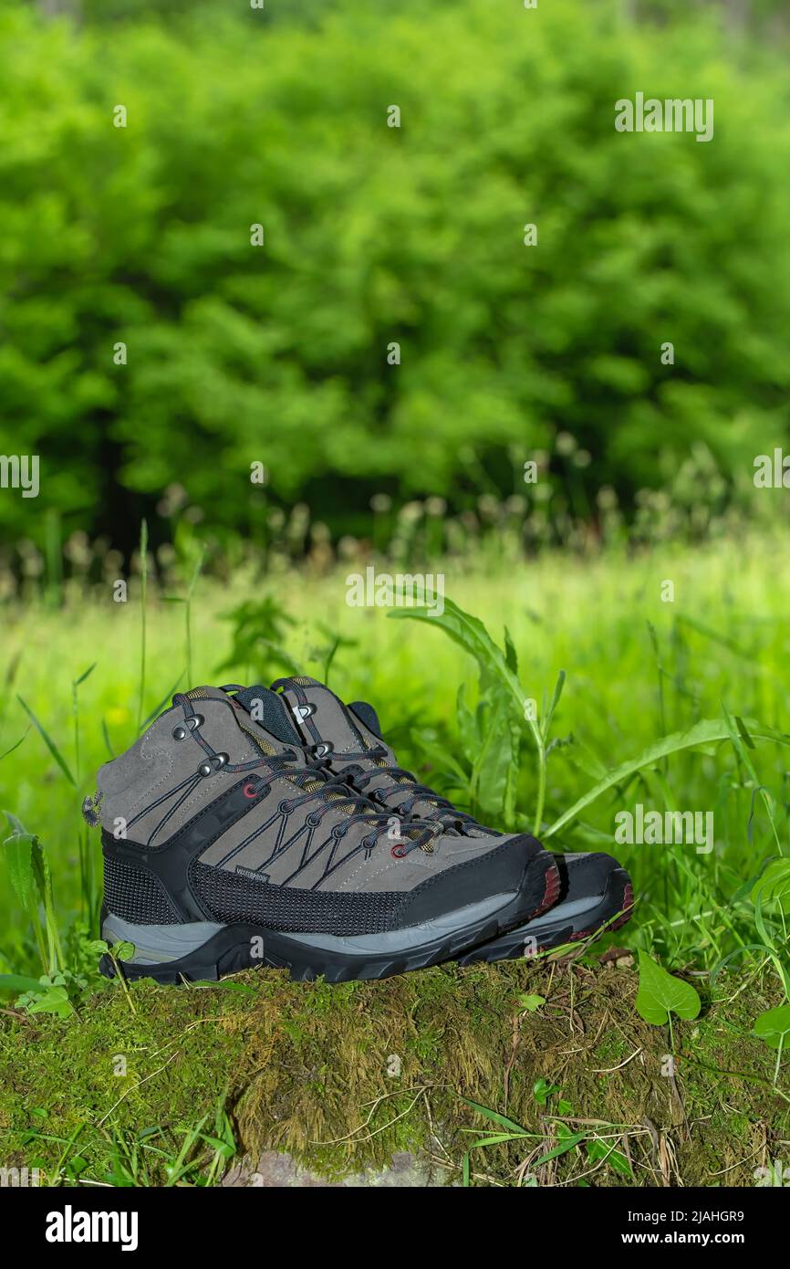 Modern waterproof mountain hiking boots with nature background Stock ...