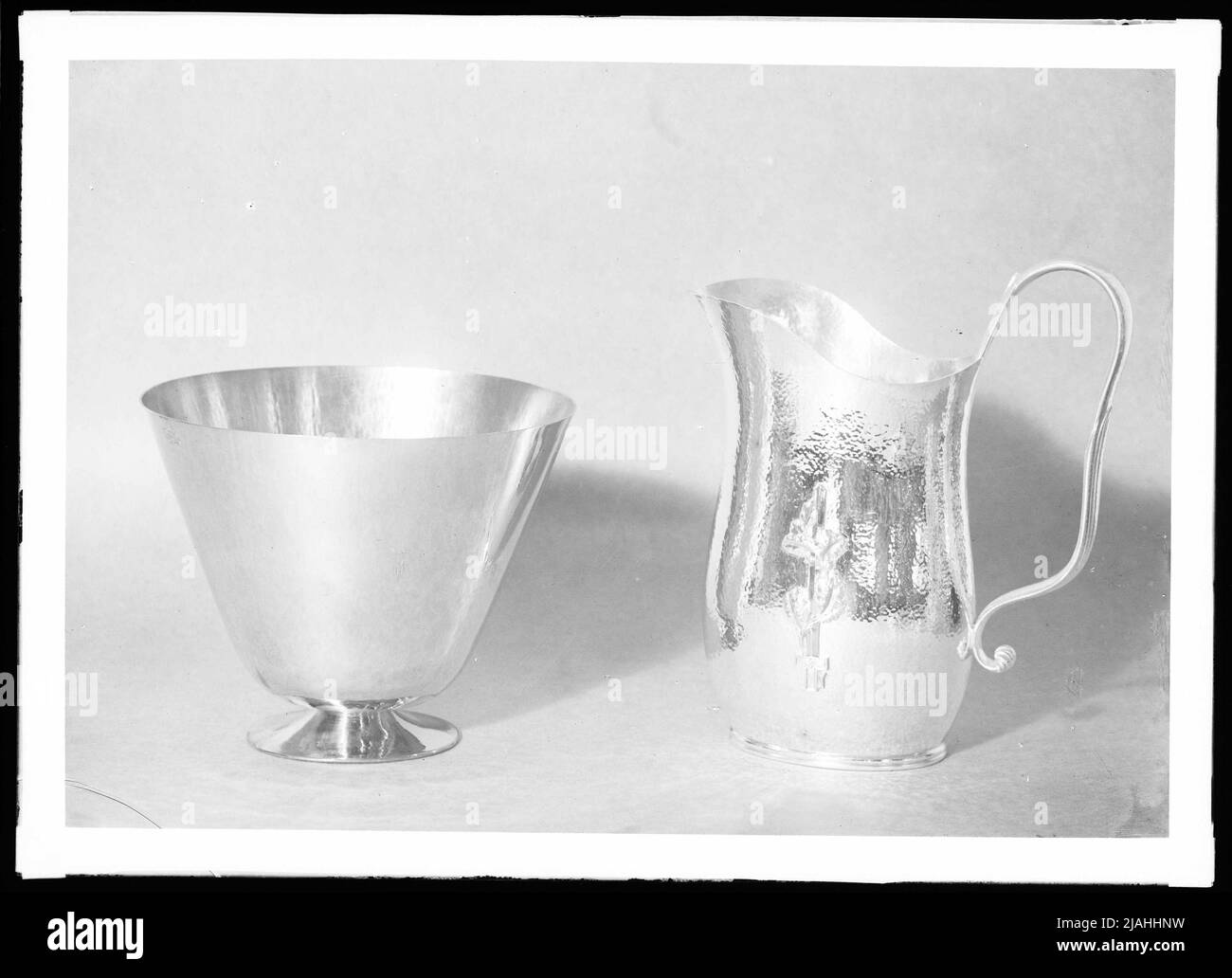 Metal cups and small jugs (brass Stock Photo - Alamy