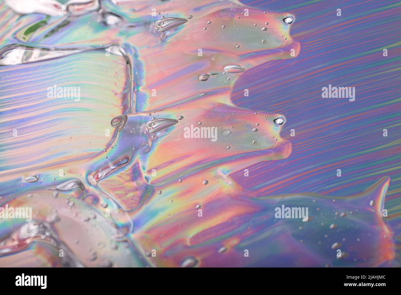 Abstract cosmetics gel on holographic background.Good as cosmetic ...