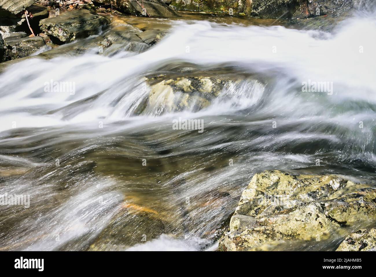 water flowing over rocks Stock Photo - Alamy