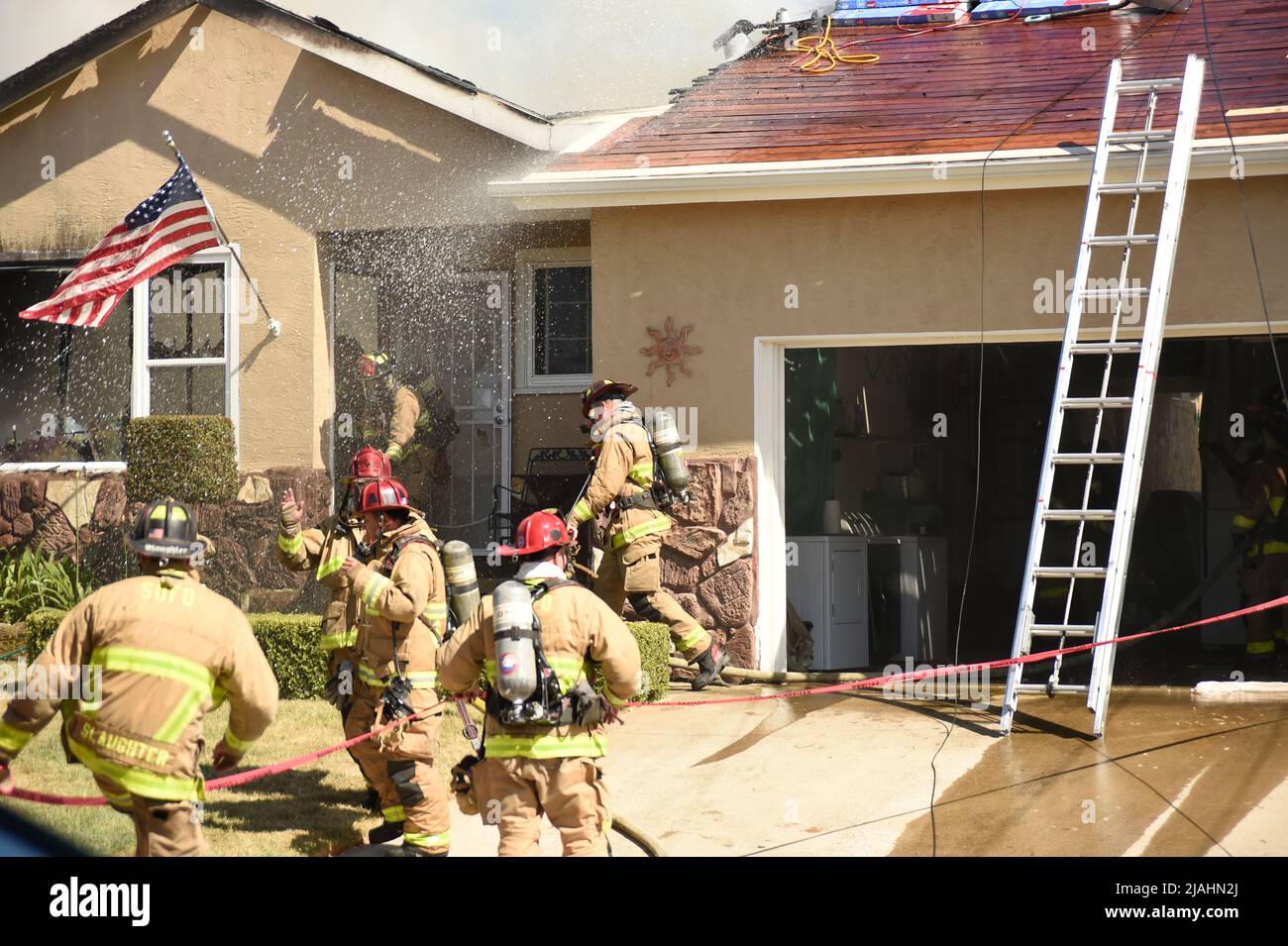 San Diego Fire-Rescue Firefighters on scene at a residential structure ...