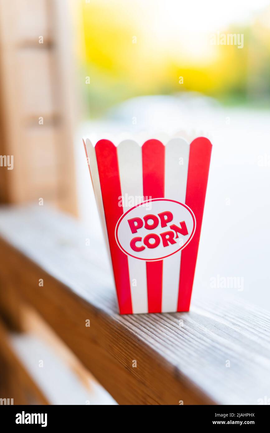 Classic red striped outdoor popcorn box. Going to the cinema Stock ...