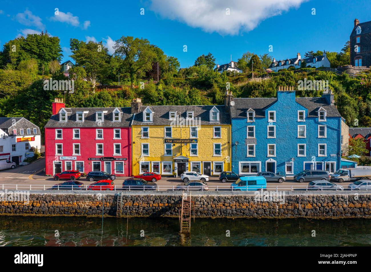 Aerial view from drone of colourful houses in village of Tobermory on ...