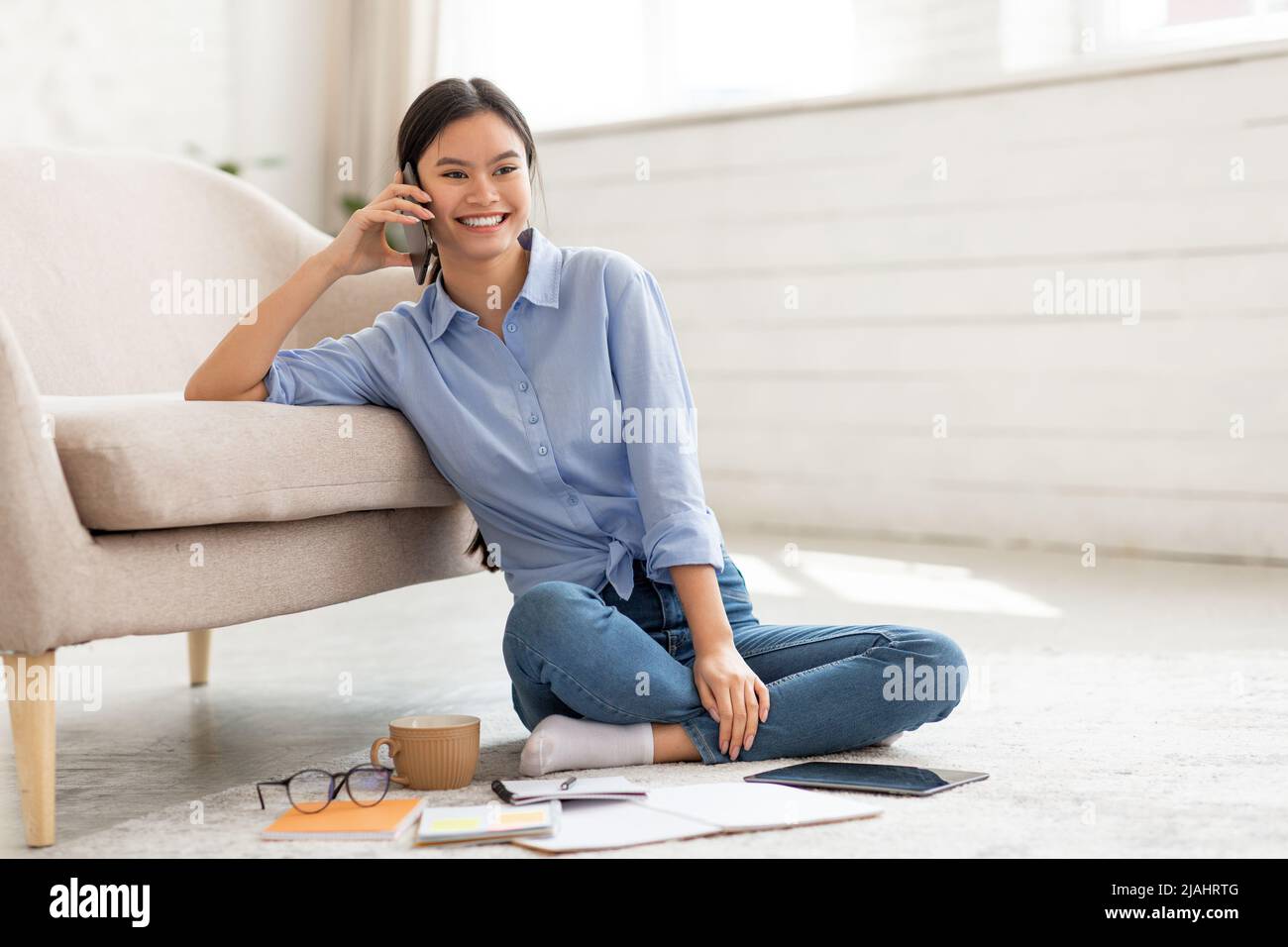 Korean woman SMM-manager working from home, having phone call Stock ...