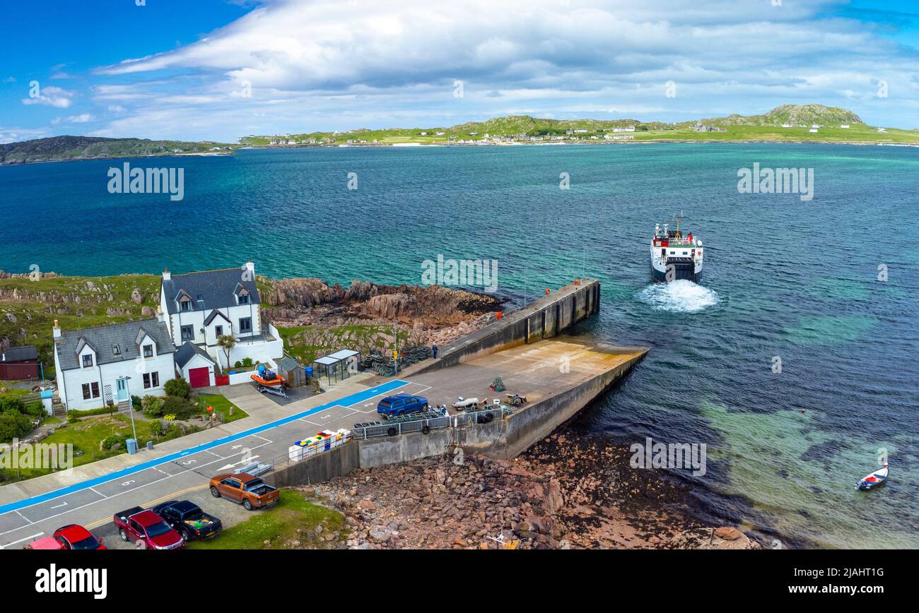 Aerial view from drone of ferry to Iona pier in village of Fionnphort ...