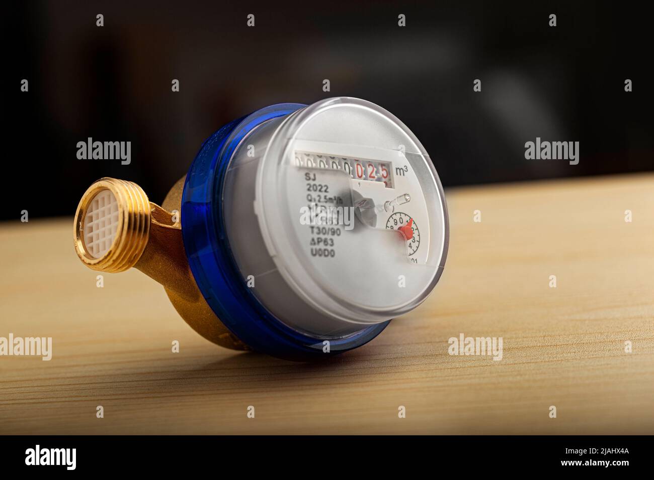 Water meter isolated. Closeup of a garden water meter to determine the ...