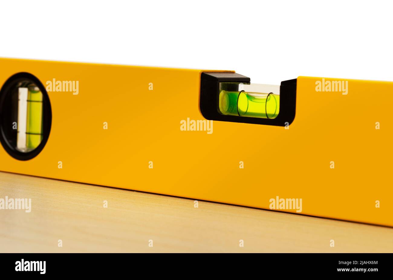 Yellow building level, isolated on a white background Stock Photo - Alamy