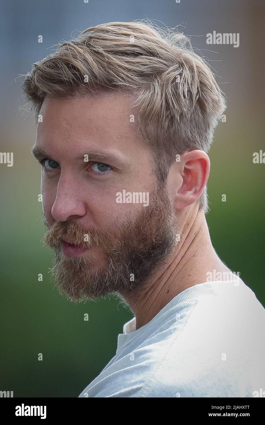 Scottish DJ Calvin Harris performing for the Liverpool FC open top bus ...