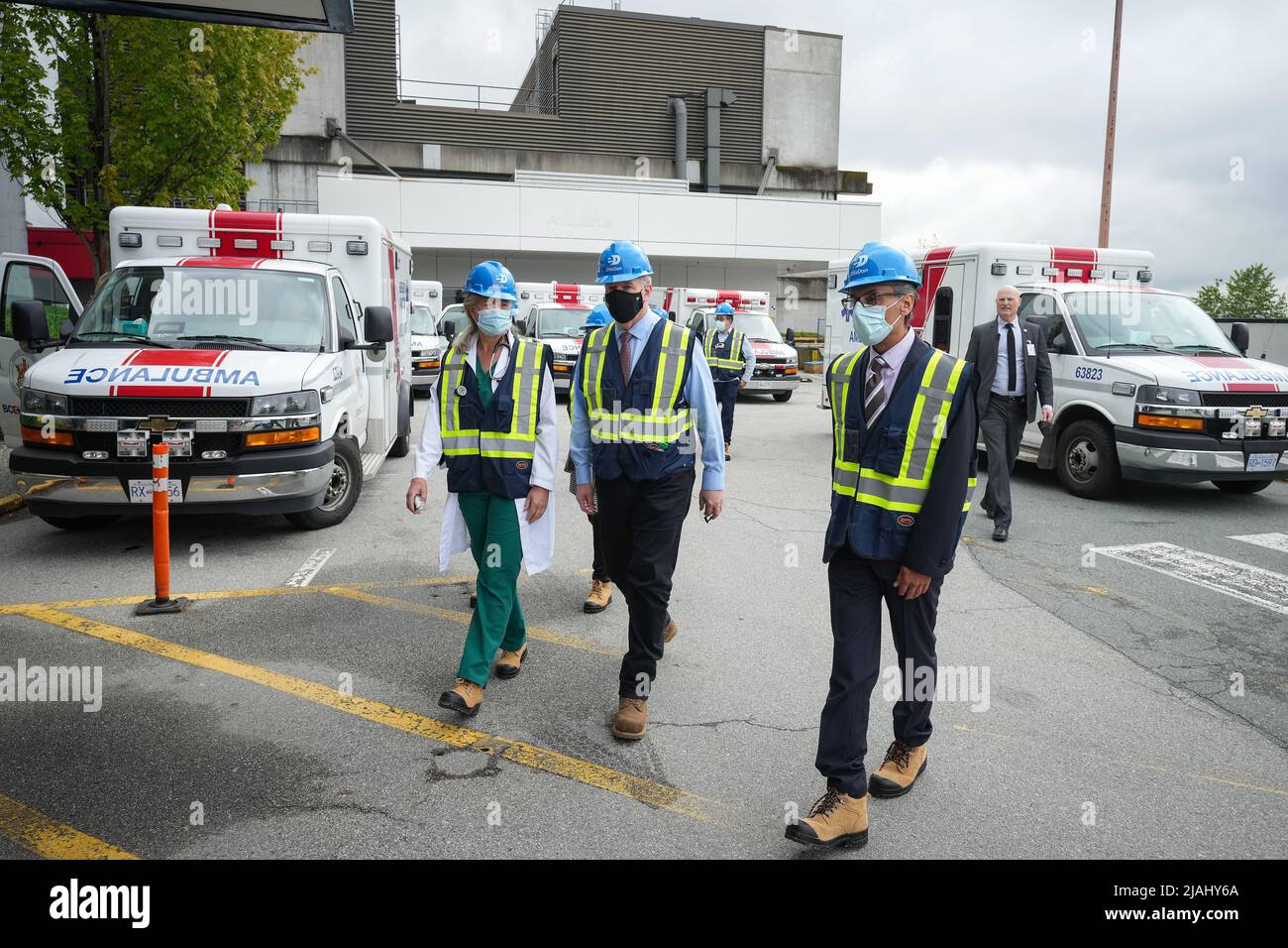 Burnaby, B.C., Canada, May 30, 2022. B.C. Premier John Horgan, centre ...