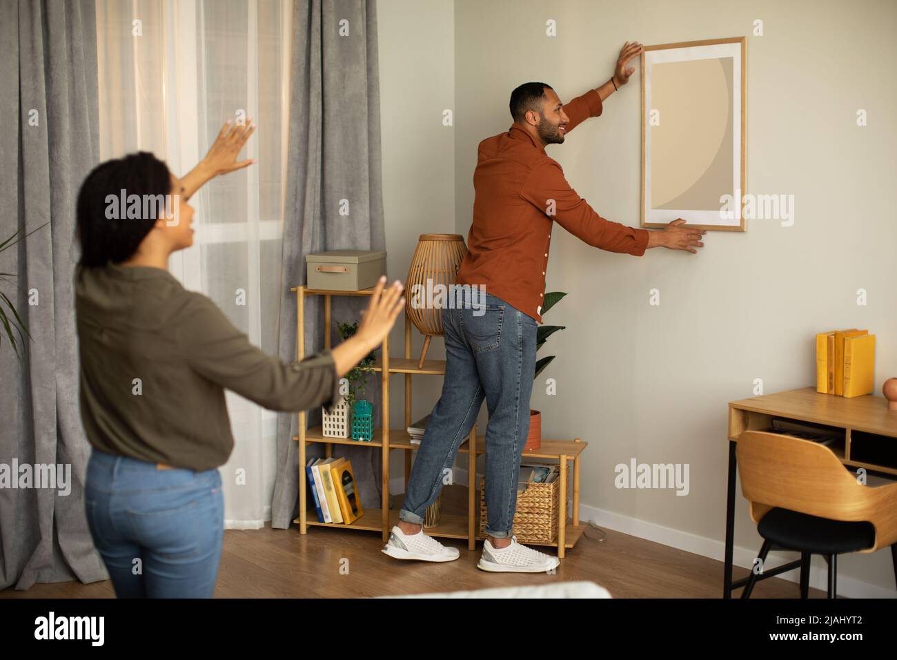 Happy black woman man hanging hi-res stock photography and images - Alamy