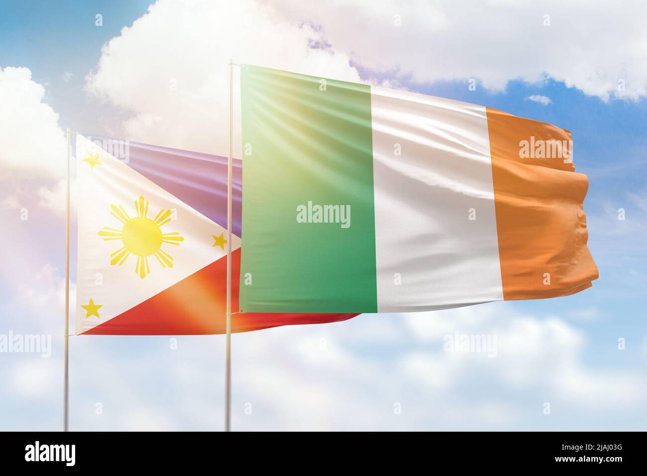 Sunny blue sky and flags of ireland and philippines Stock Photo - Alamy