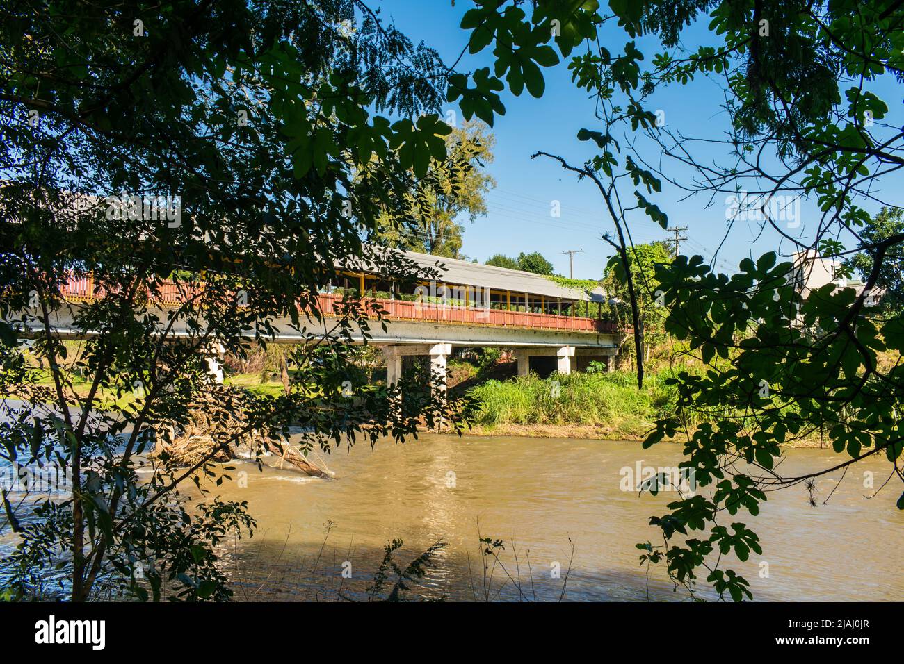 Paranhana river and a view of the covered bridge - a historical ...