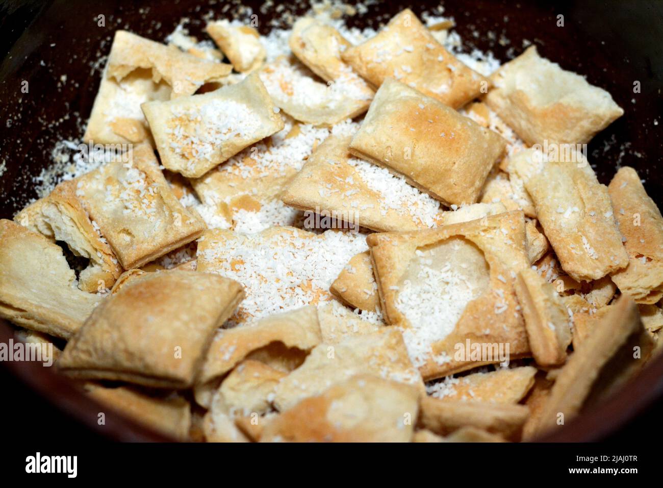 Egyptian Bread Pudding in a brown bowl pottery casserole made of milk ...