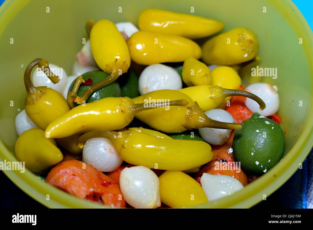 Egyptian pickles inside a deep plastic bowl, marinated preserved ...