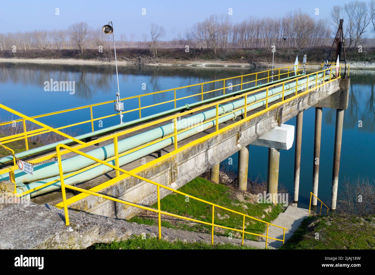 View of storage tank and pipes of chemical industry, Italy Stock Photo ...