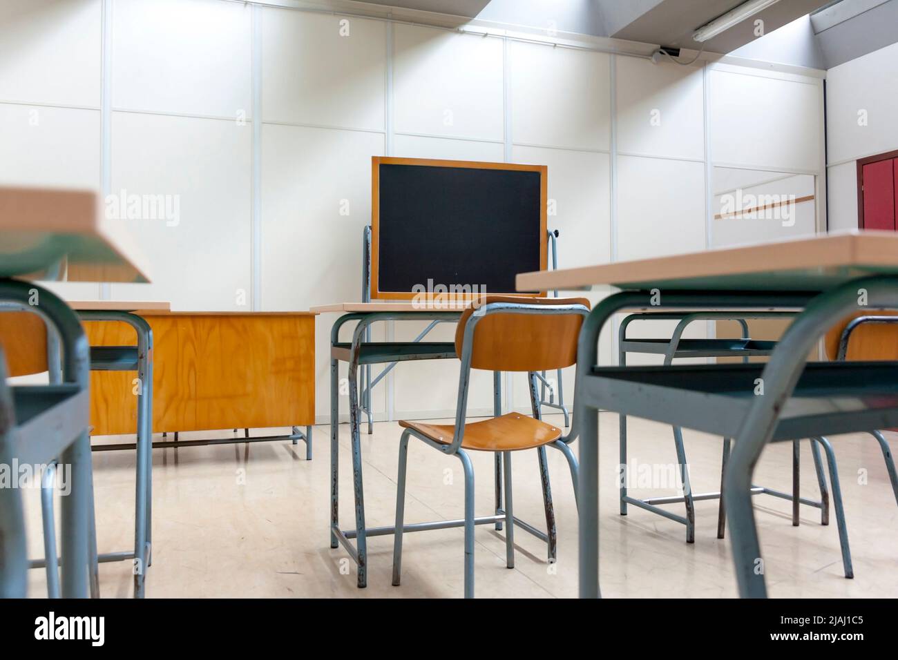 desks and blackboard in classroom at school Stock Photo - Alamy