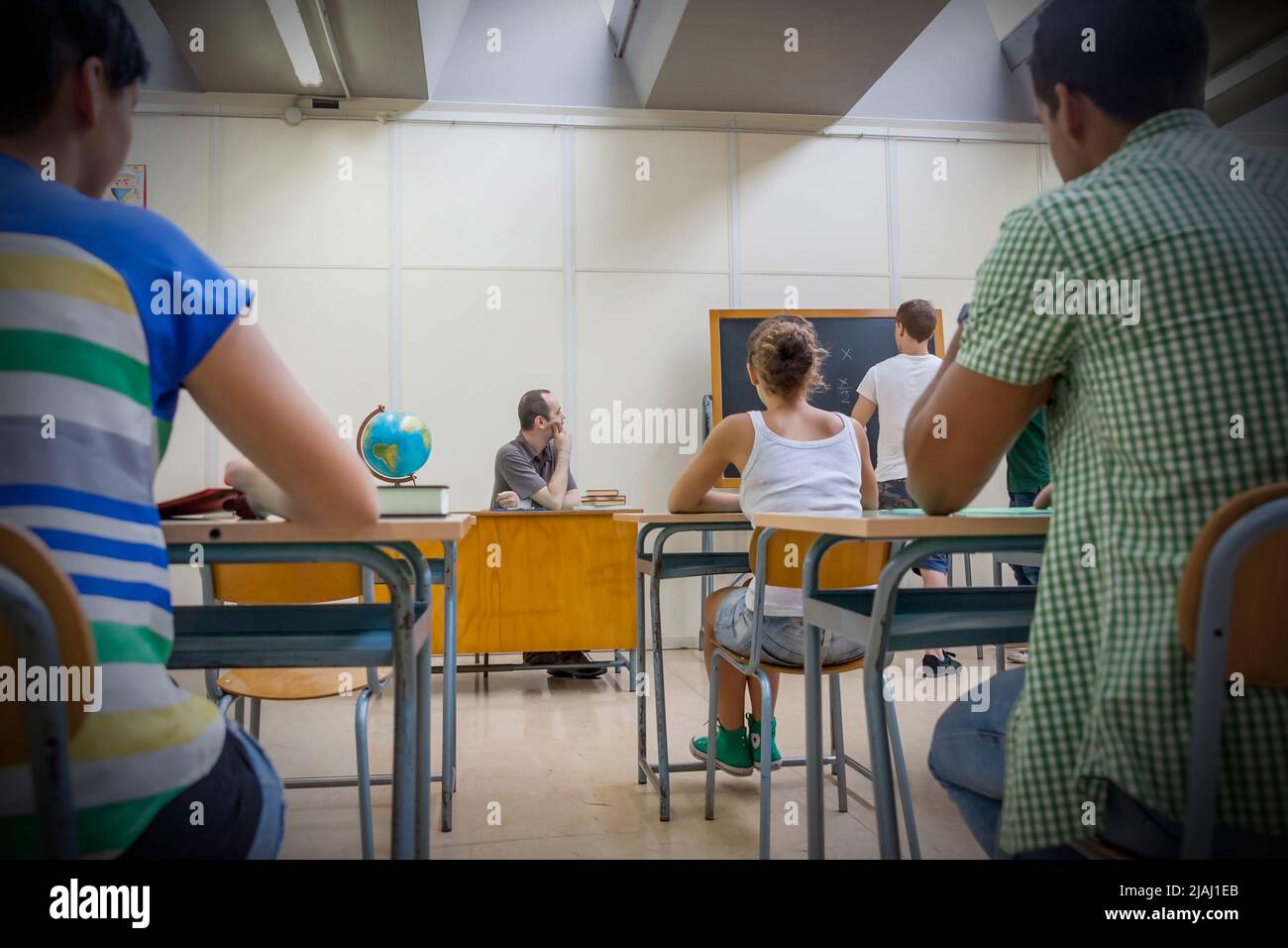 group of students follow the lesson in a classroom Stock Photo - Alamy