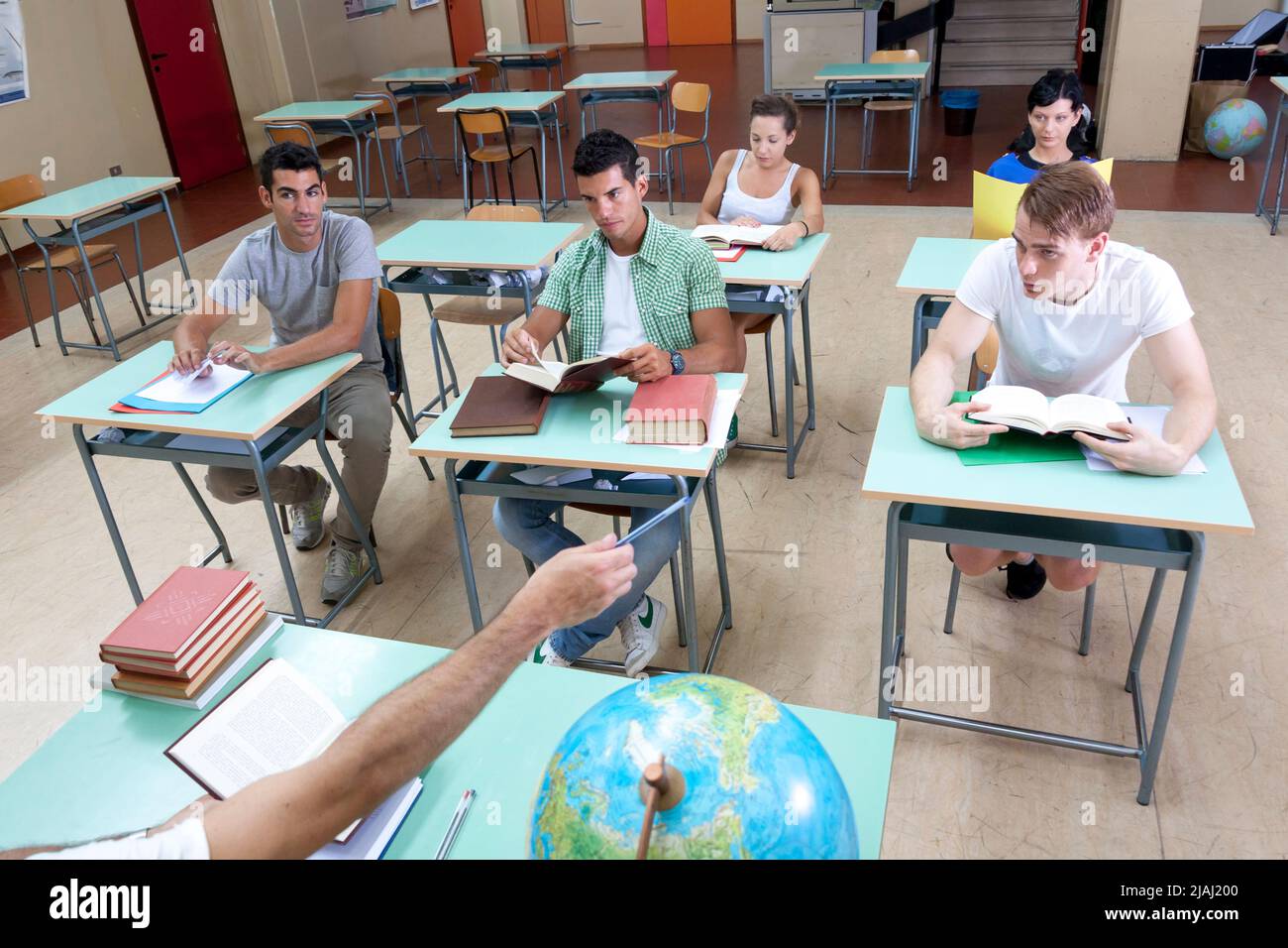 group of students follow the lesson in a classroom Stock Photo - Alamy