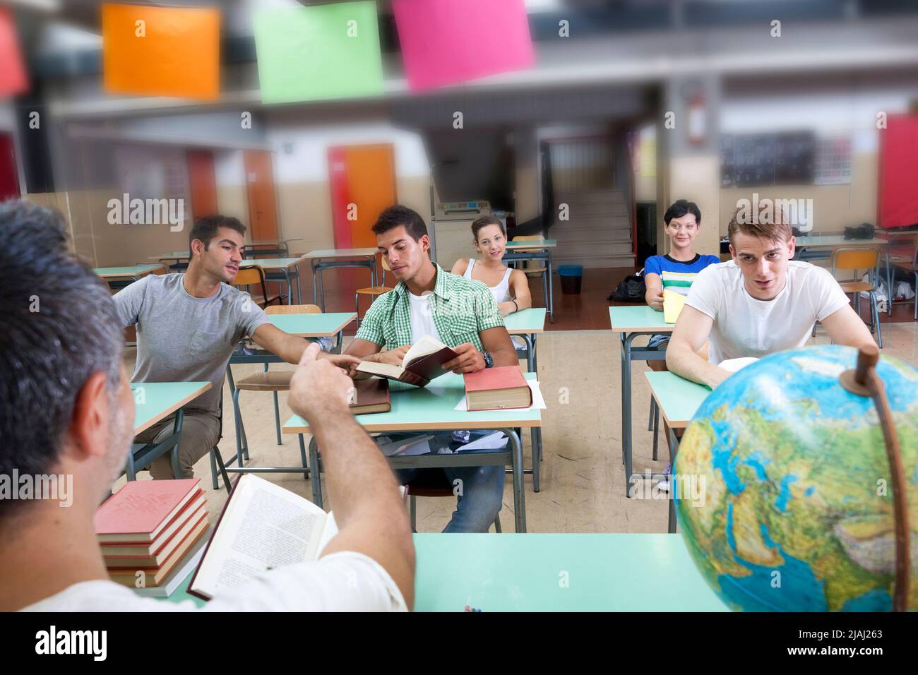 group of students follow the lesson in a classroom Stock Photo - Alamy