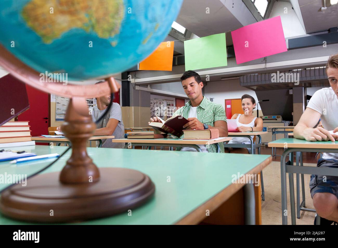 group of students follow the lesson in a classroom Stock Photo - Alamy