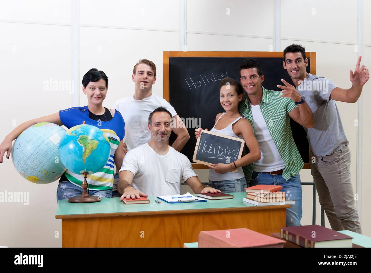 students celebrate the last day of school in a classroom Stock Photo ...
