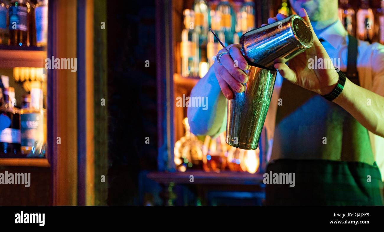Hands bartender drink bottle hi-res stock photography and images - Alamy