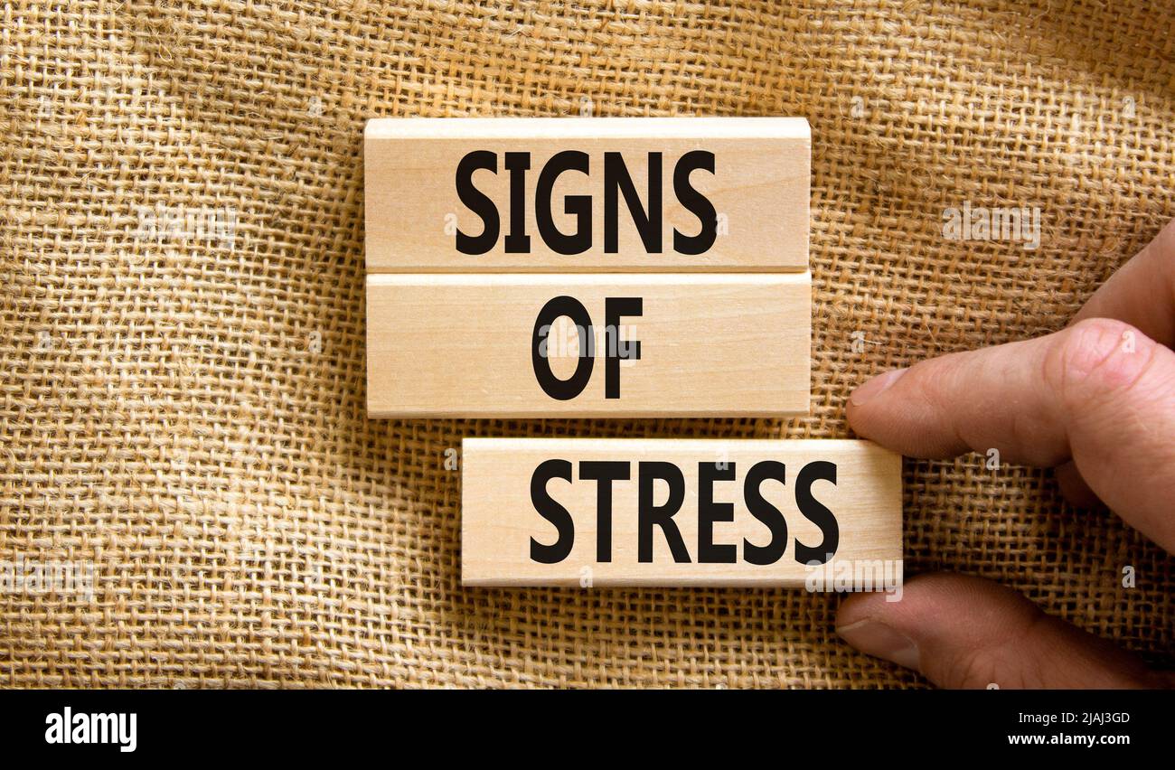 Signs of stress symbol. Concept words Signs of stress on wooden blocks ...
