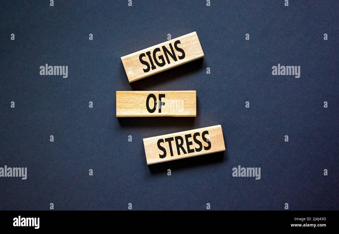 Signs of stress symbol. Concept words Signs of stress on wooden blocks ...