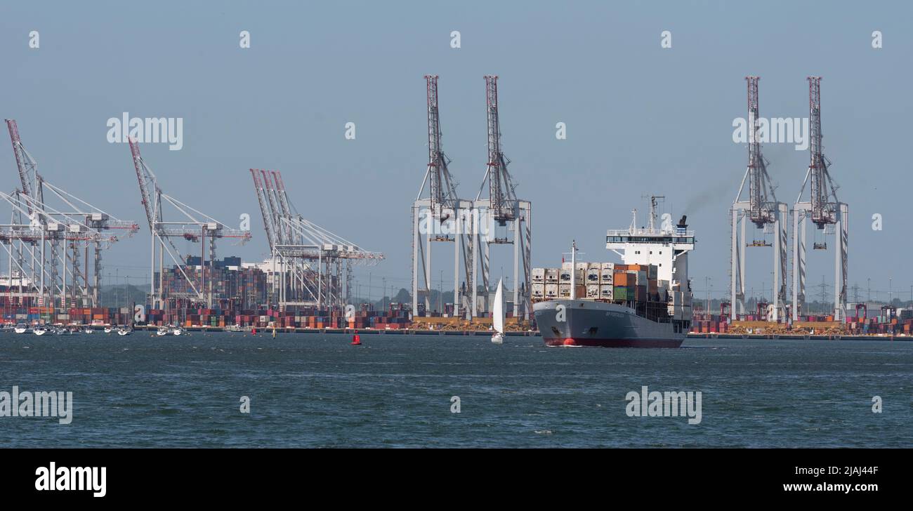 DP World Southampton, UK. 2022. Small container carrier ship departing ...