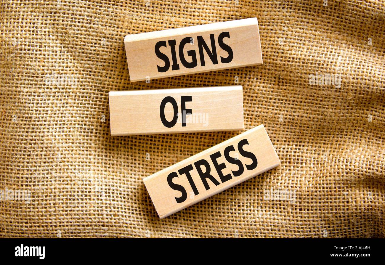 Signs of stress symbol. Concept words Signs of stress on wooden blocks ...