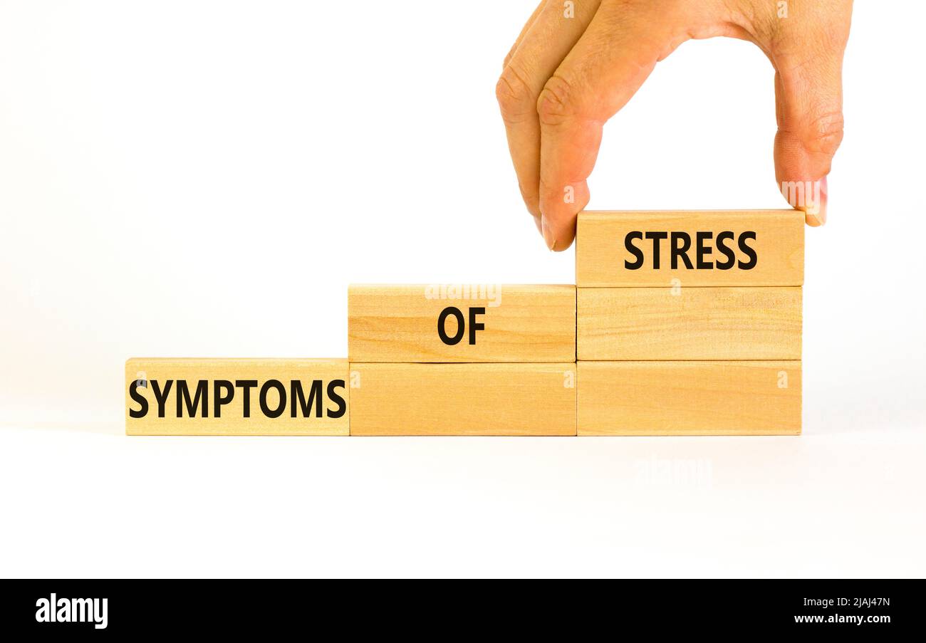 Symptoms of stress symbol. Concept words Symptoms of stress on wooden ...