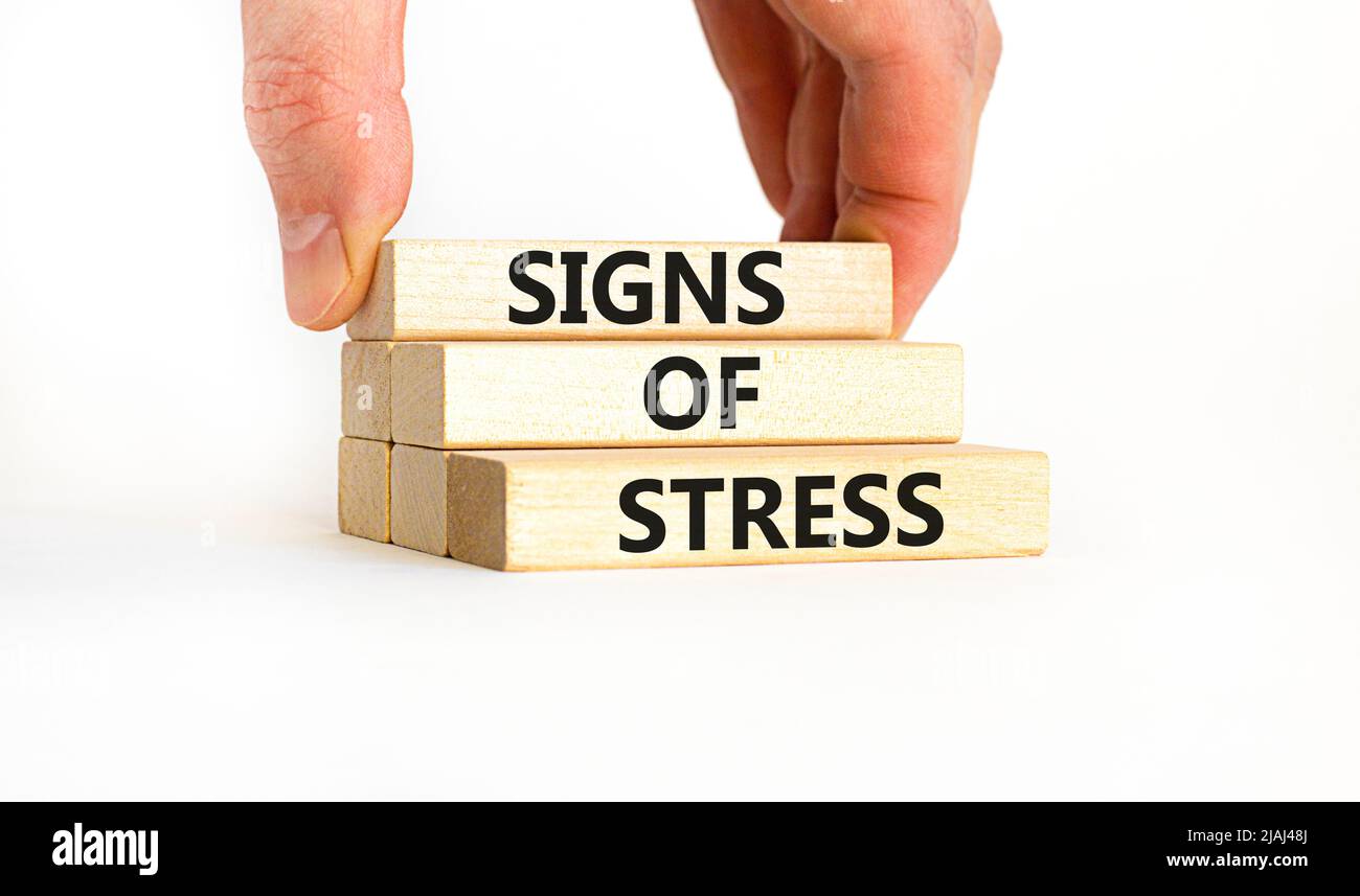 Signs of stress symbol. Concept words Signs of stress on wooden blocks ...