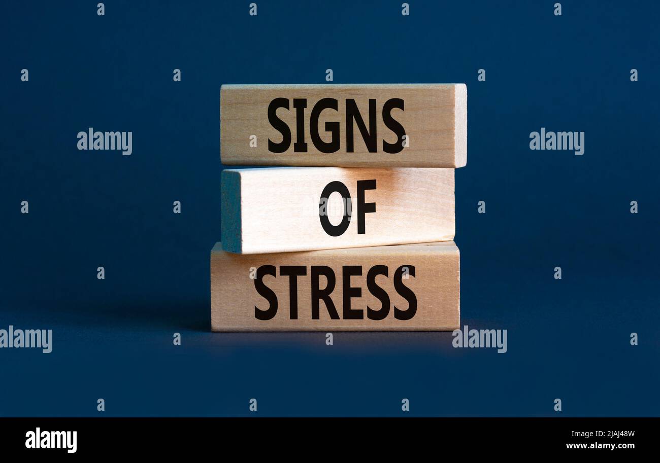 Signs of stress symbol. Concept words Signs of stress on wooden blocks ...